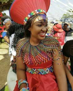 Zulu Bride In Red Wedding Dress With Beaded Belt, Cape and Red Beaded ...