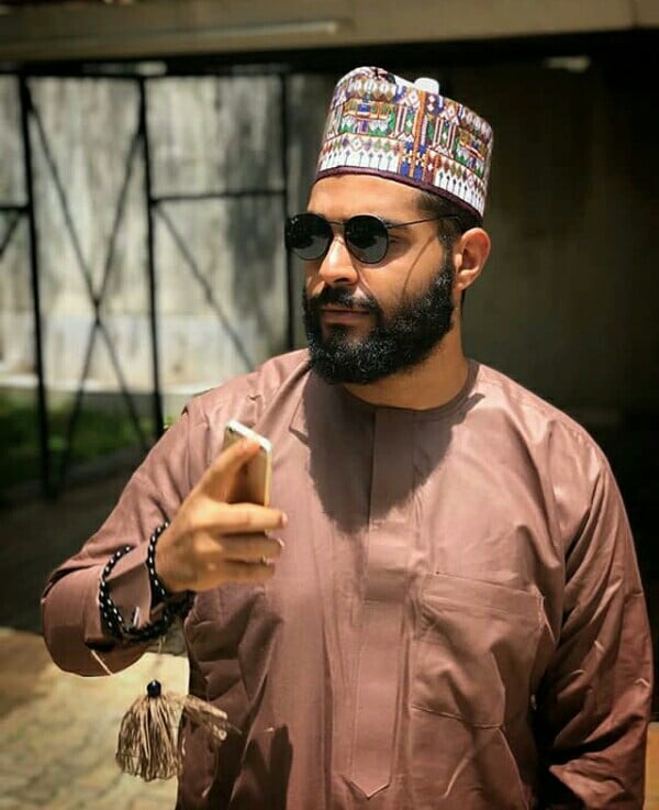 Clipkulture | Man In Bright Coloured Hand Made Tangaran Cap