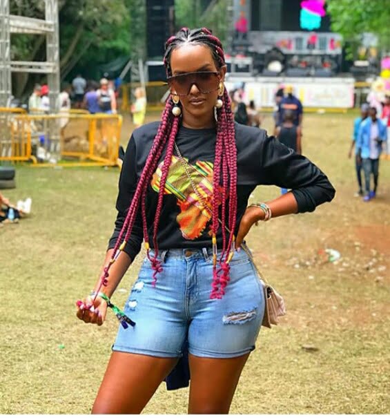 Clipkulture | Lucy Smize in her Red All back Cornrows with Extensions