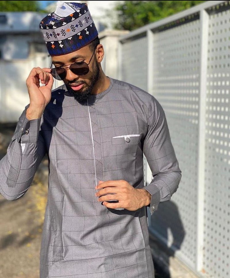 Clipkulture | Man In Grey Patterned Senator Wear and Tangaran Cap