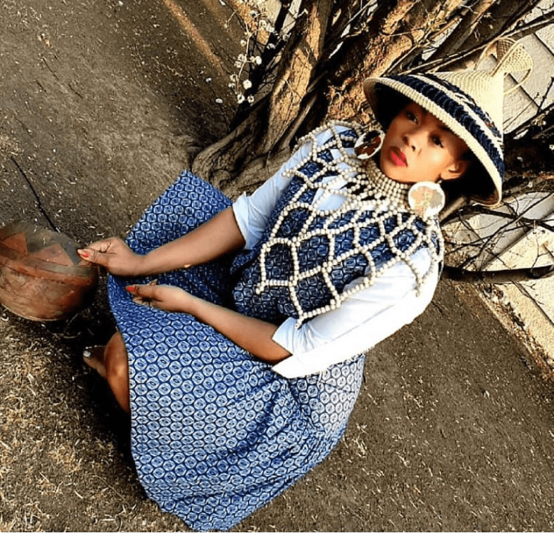 Clipkulture | Pinky In Sotho Seshoeshoe Pinafore Dress, Beaded Neckpiece and Kobo Hat